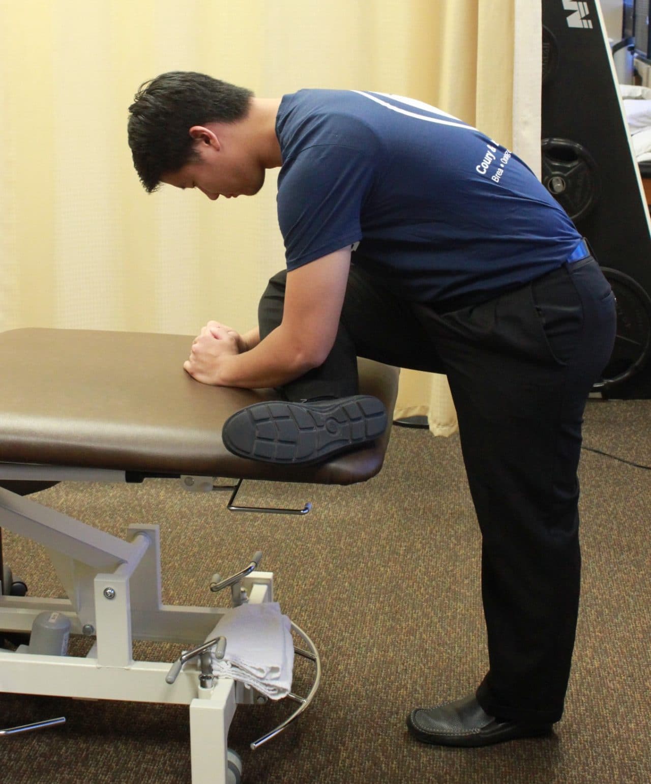 Piriformis Stretch Standing - Coury & Buehler Physical Therapy